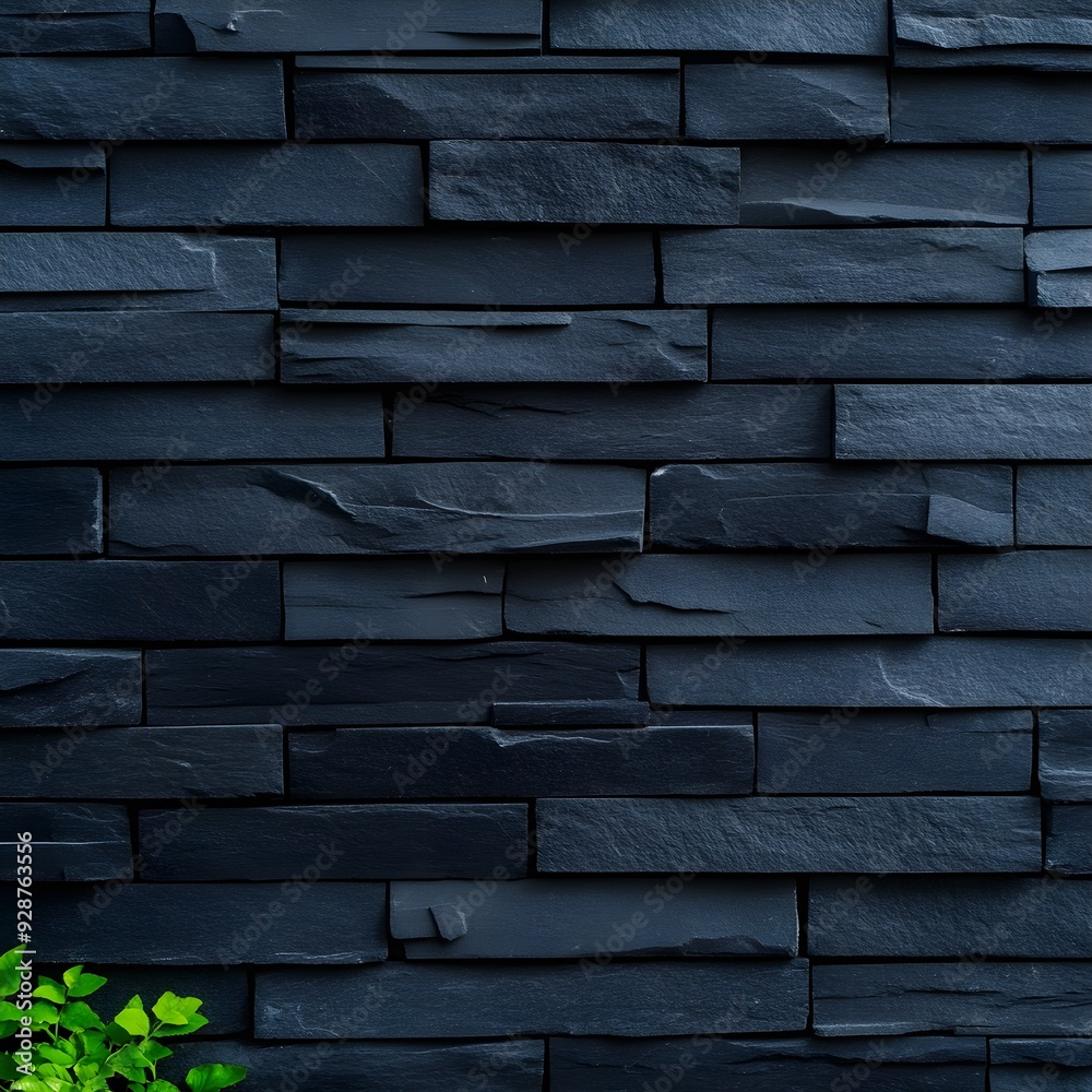 Abstract view of a black stone brick wall, with close-up textures and ...