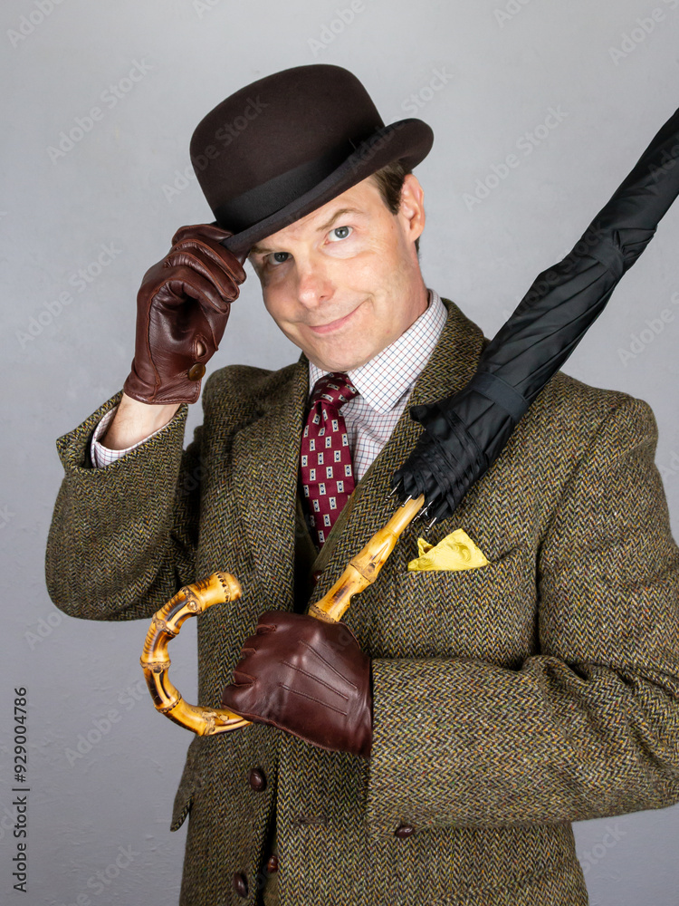 British Gentleman in Tweed Suit Doffing Bowler Hat. Vintage Style and ...