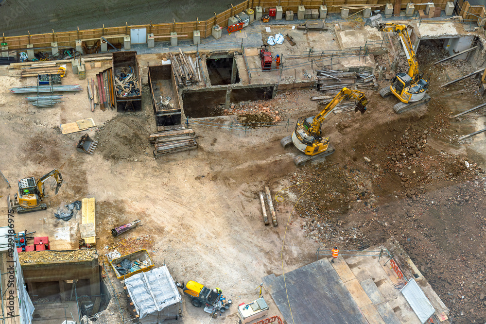 Aerial view of a construction site and building site with heavy ...
