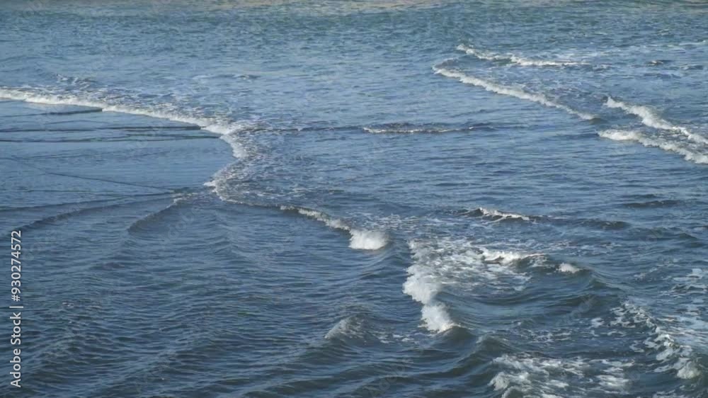 Abstract patterns, shapes and textures of sea wave movements on beach ...