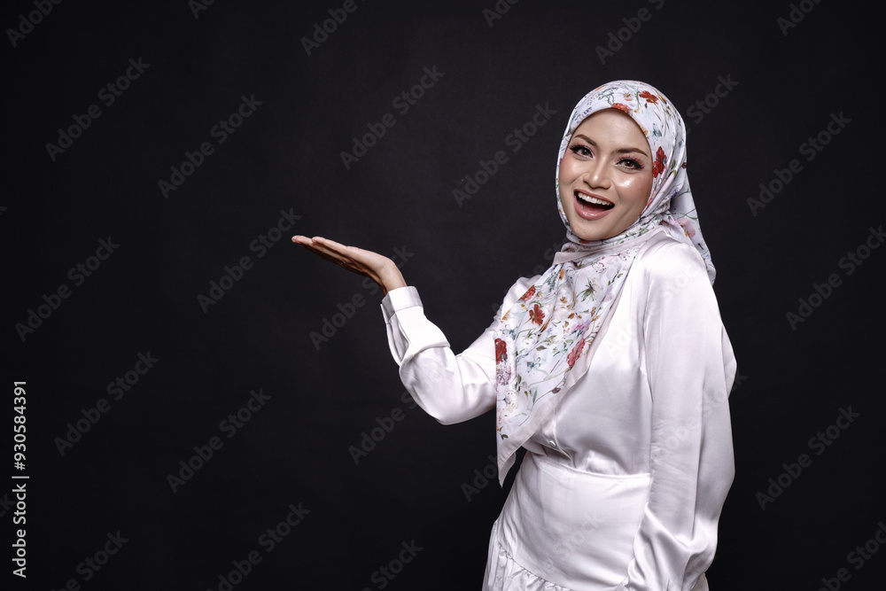 Asian hijab girl in white dress and hijab, give a happy hand gesture ...