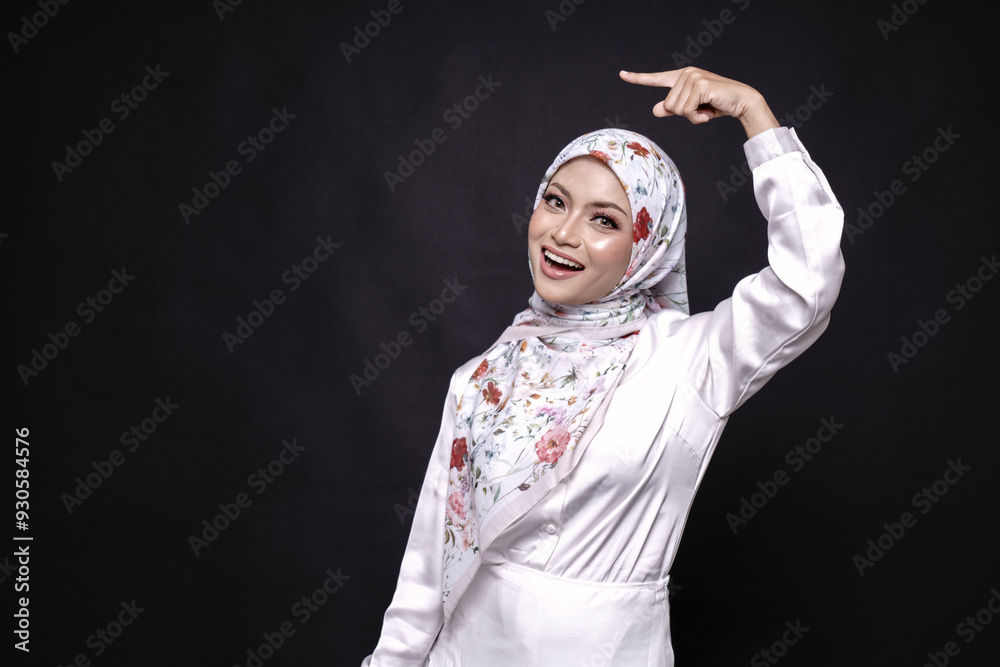 Asian hijab girl in white dress and hijab, give a happy hand gesture ...