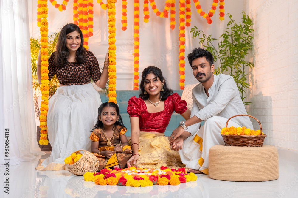 Happy Onam image, Beautiful family celebrating Onam by arranging Onam ...