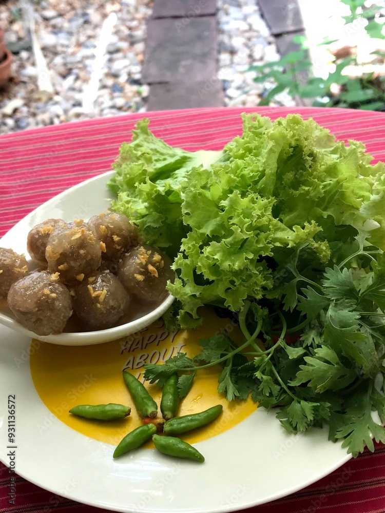 "Saku Sai Moo" is a traditional Thai snack made from steamed tapioca ...
