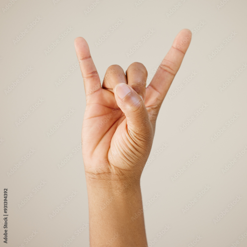 Poster Rock and roll, hands and person with icon in studio background ...