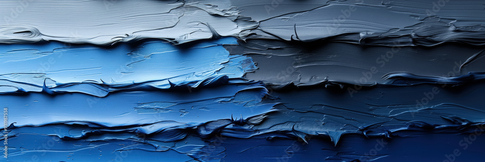 Thick layers of blue and gray paint applied with a palette knife ...