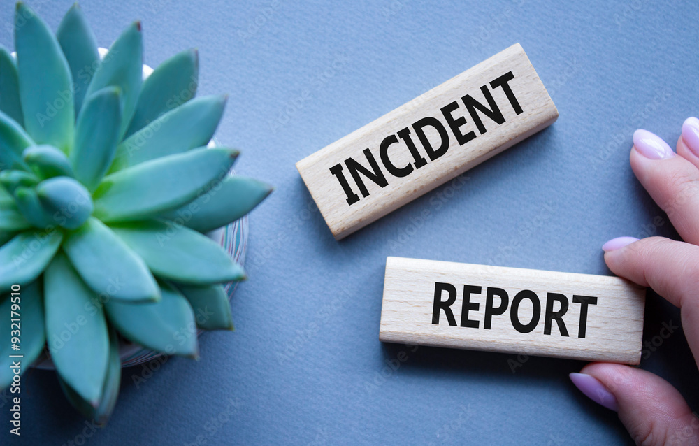 Incident Report symbol. Concept word Incident Report on wooden blocks ...