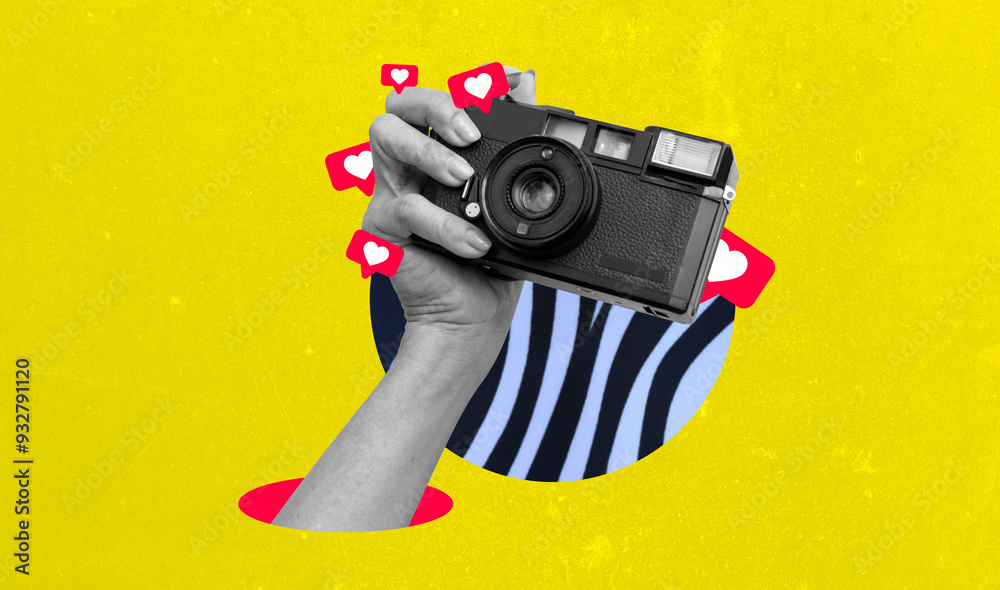 Show hand holding camera, taking photo isolated over blue background ...