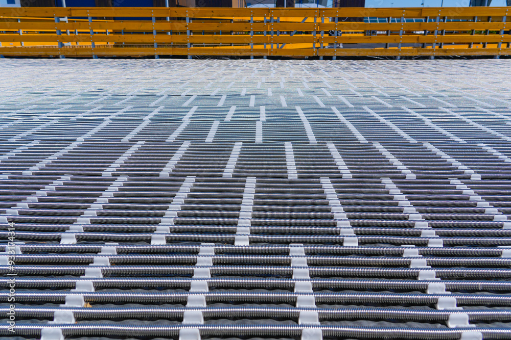 Floor surface with pipes and tubes for skating rink temperature and ...