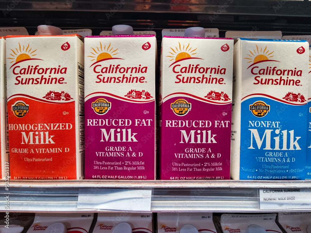 Variety of California Sunshine milk cartons on store shelf Stock Photo ...