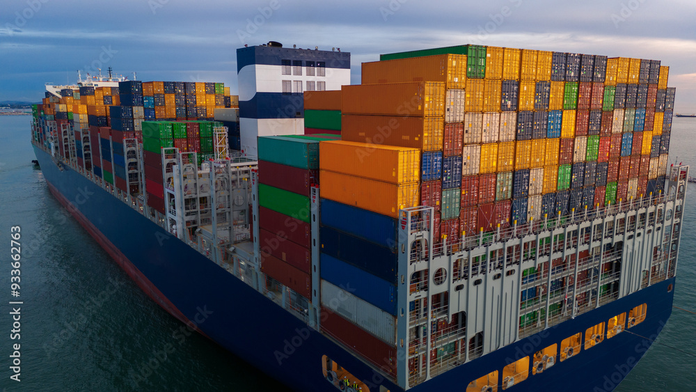 Stern cargo container ship at sunset feight import export container box ...