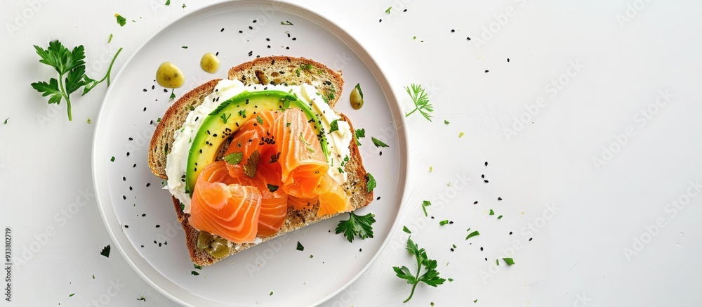 Top view of a healthy breakfast plate featuring a sandwich filled with ...