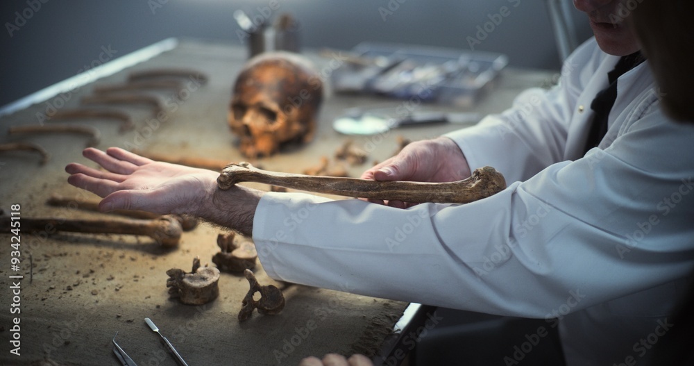 Archaeologist shows size of ancient man bone to colleague and talks ...