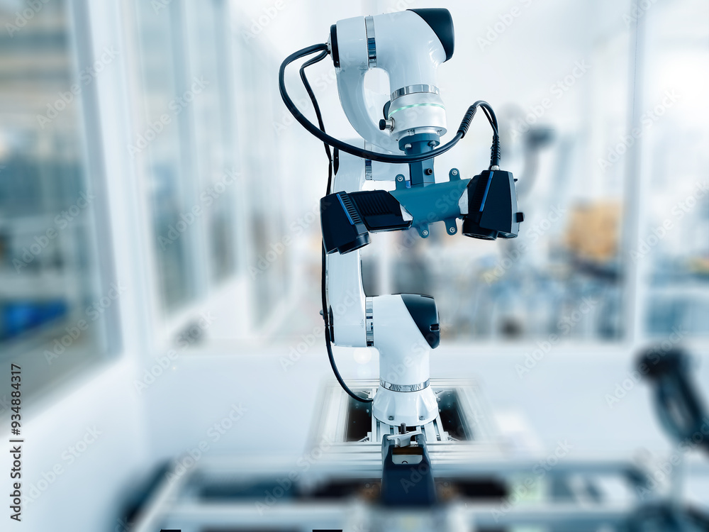 Robotic arm equipped with high-tech 3D scanner in an advanced ...