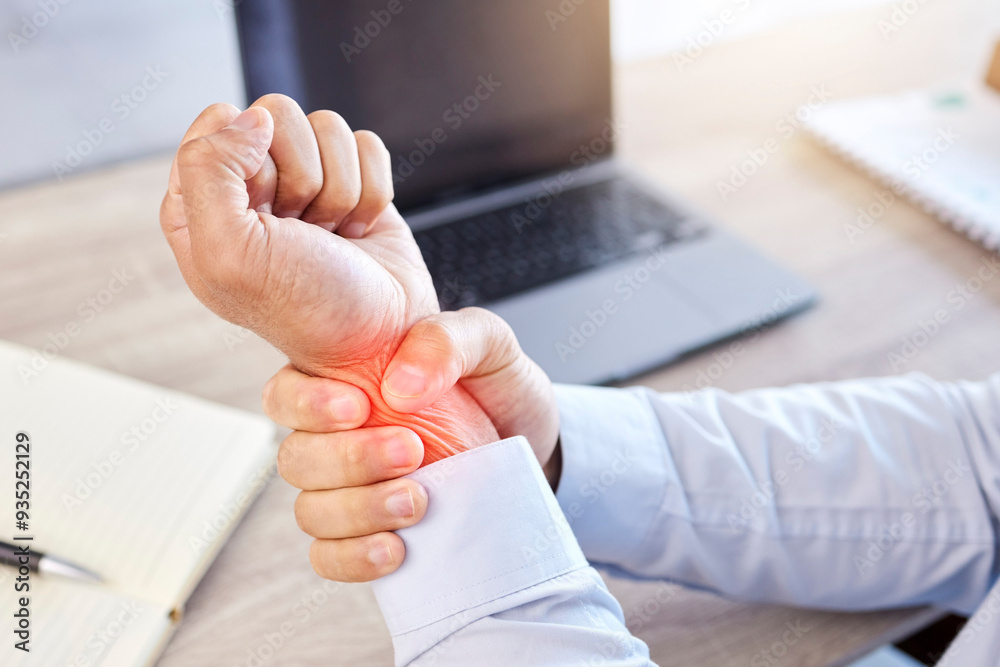 Arthritis, injury or wrist pain with business man at desk in office ...