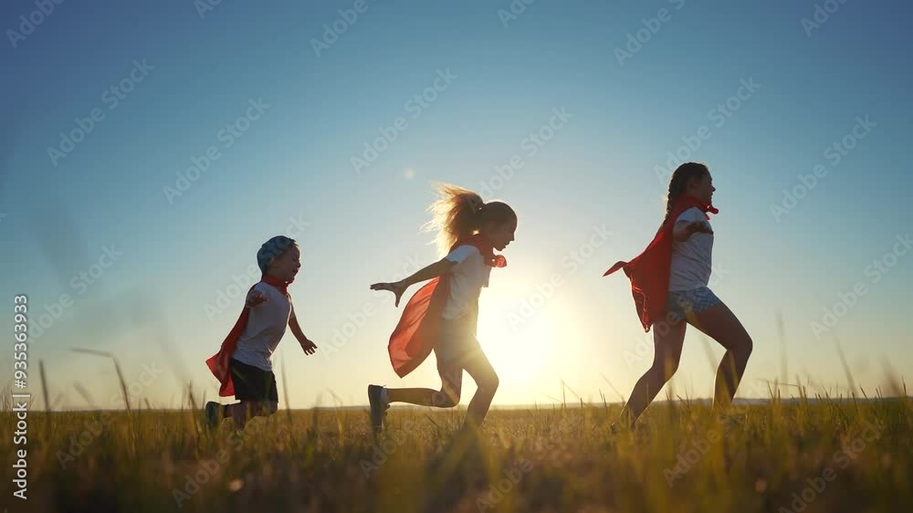 A group of kids are running around with superheroes. Hero super child ...