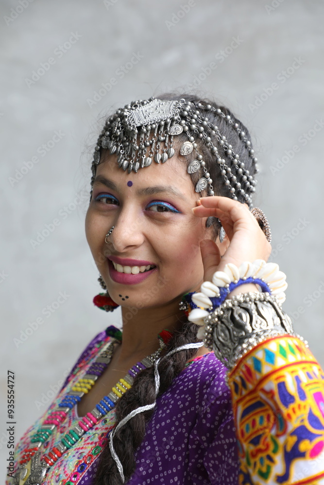 woman wearing chaniya choli shrug and oxidized jewellery for garba and ...