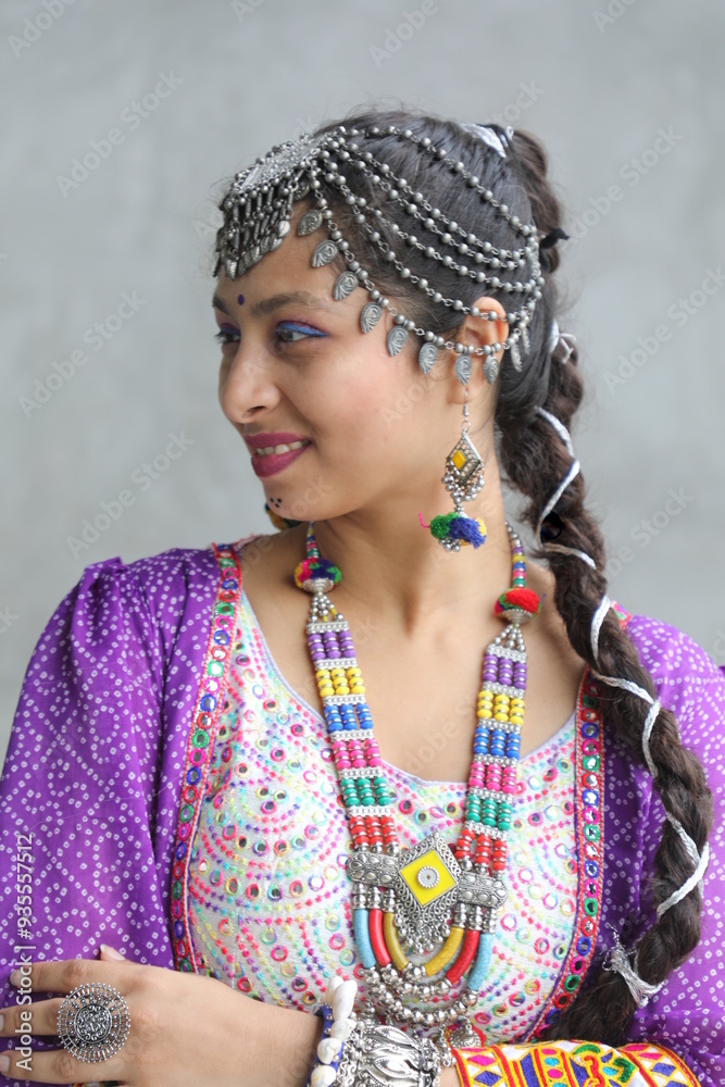 woman wearing chaniya choli shrug and oxidized jewellery for garba and ...