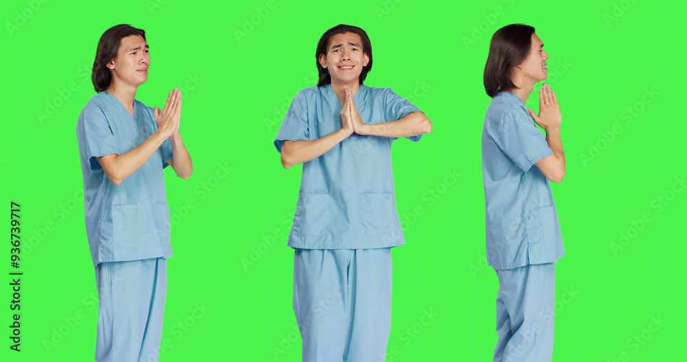 Medical assistant praying to Jesus in studio, holding hands in a prayer ...