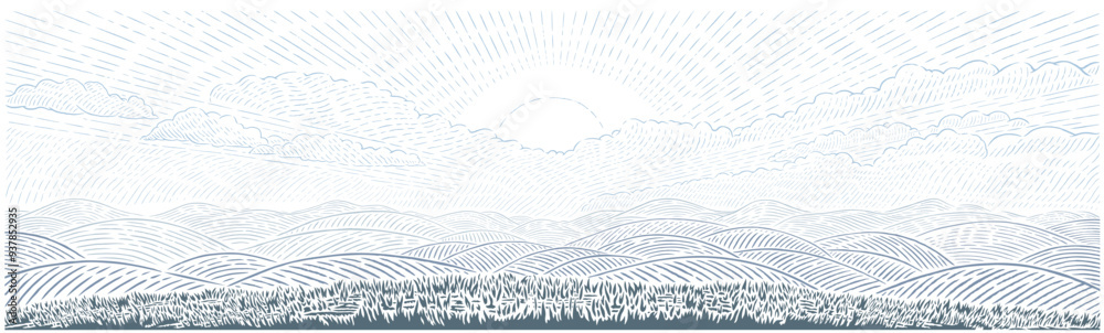 Rural hilly landscape panoramic format with dawn sun and hills and ...