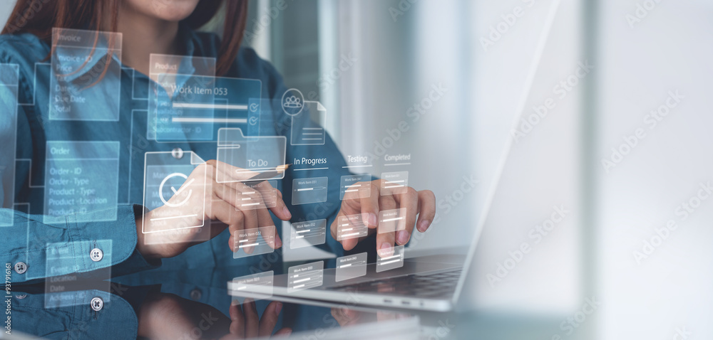 Business project manager using Kanban board framework on laptop ...