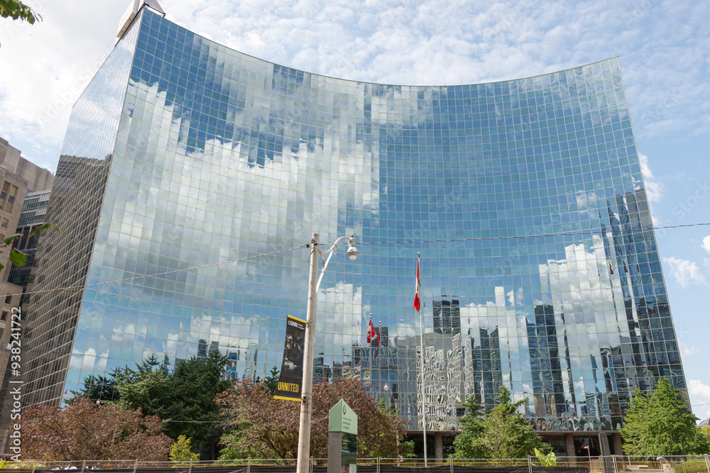 abstract view of 700 University Avenue (curved building with mirror ...