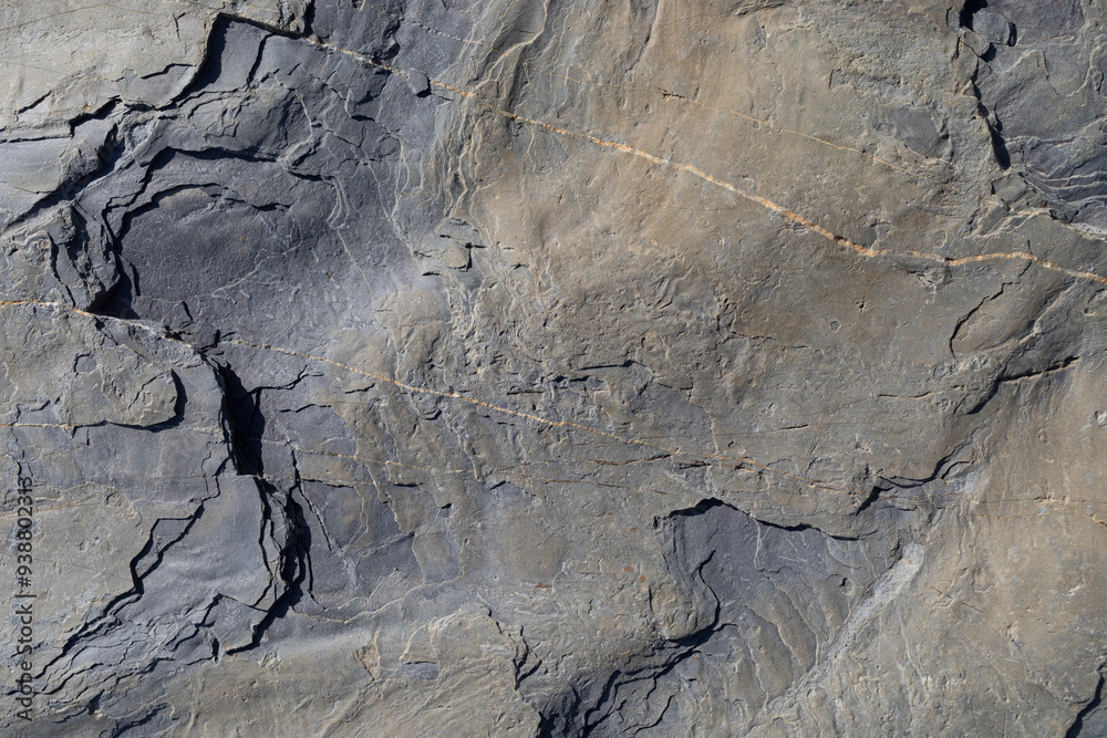 Rocks worn by wind and sea found on a wild beach, which is part of a ...