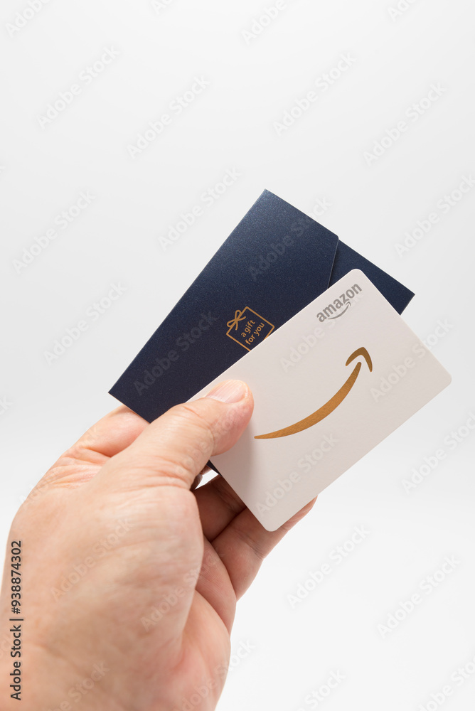 Fuji-shi, Shizuoka-ken, Japan - August 24, 2024 - Hand holding Amazon ...