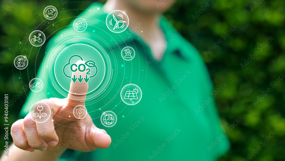 Point by hand with co2, ESG and net zero. Carbon reduction strategy and ...