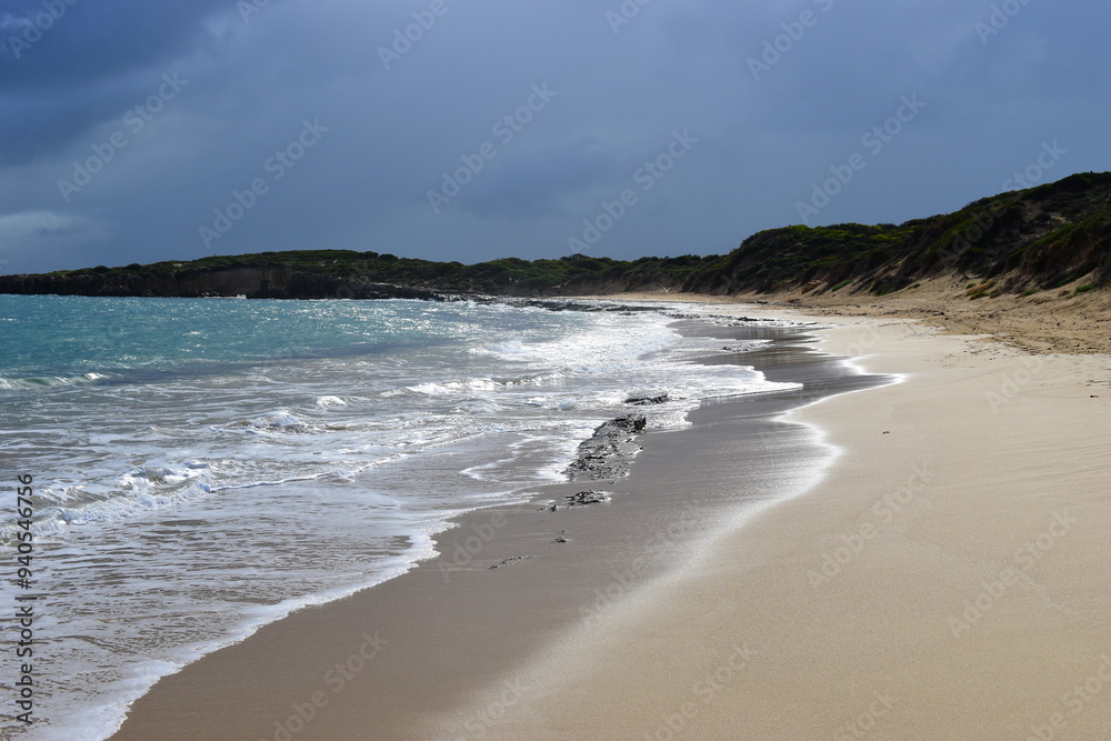 Rocky limestone formations on the coast and beaches of Point Peron ...