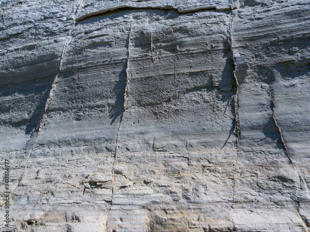 Vertical high rock made of white shell rock near the Black Sea coast ...