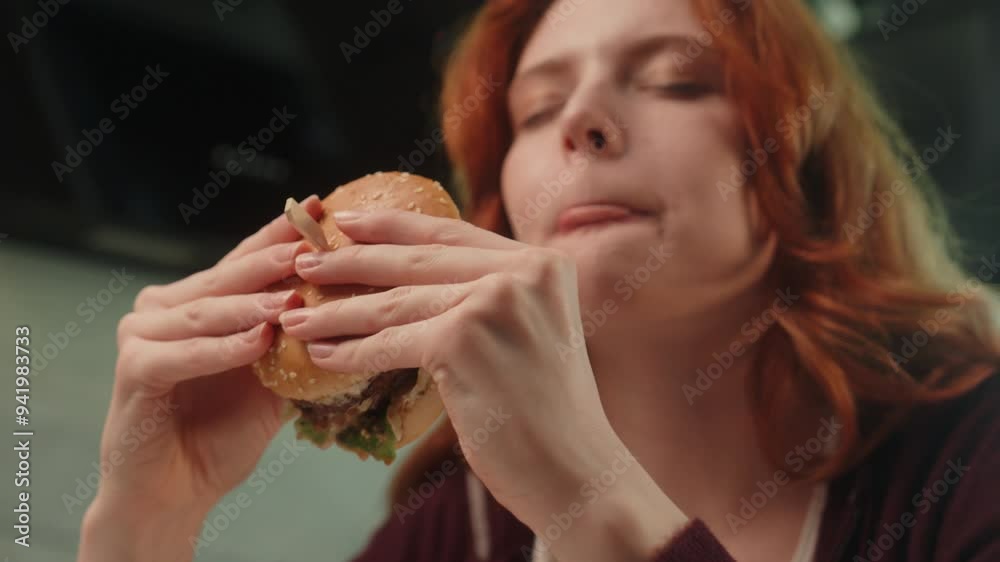 Happy hungry Caucasian woman female girl client customer eat chew tasty ...