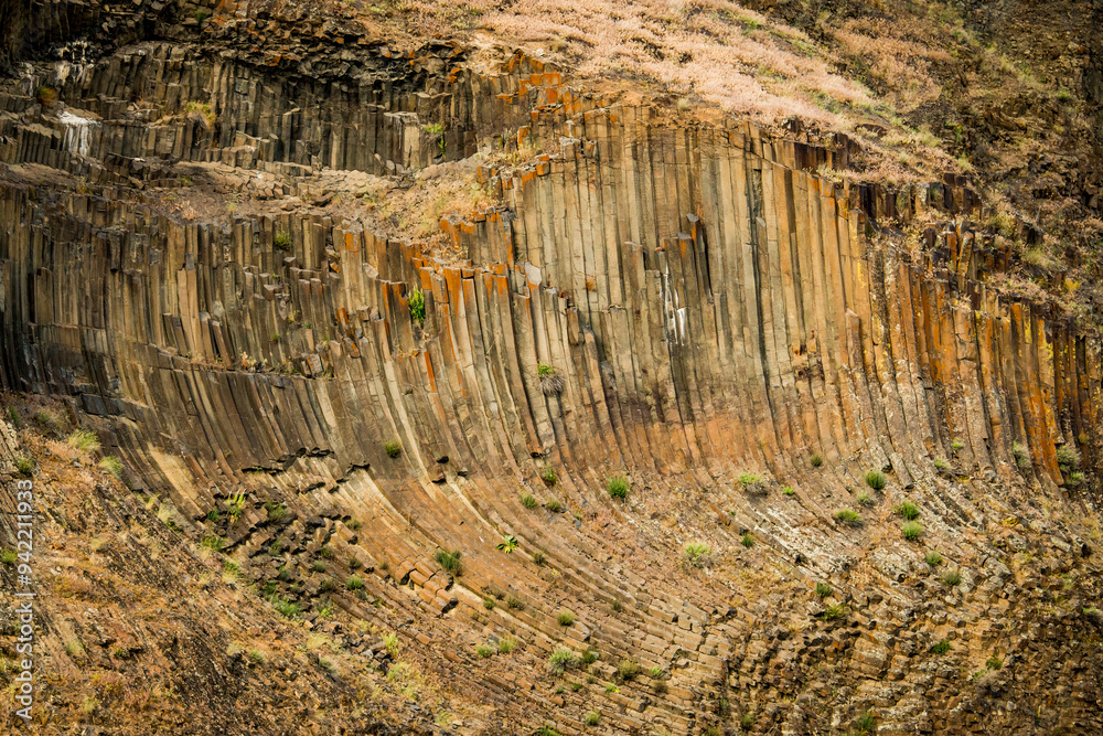 USA, Idaho. Hells Canyon, columnar basalt joining and Permian rhyolite ...