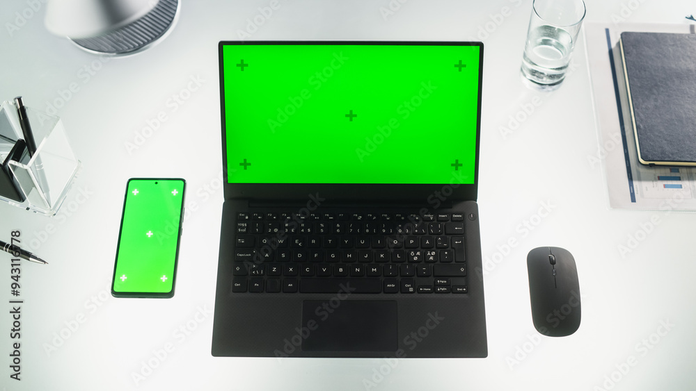 Top Down View of a Laptop Computer with Mock Up Green Screen Standing ...