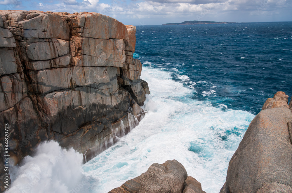 A coastal landscape featuring The Gap in Western Australia. Rugged ...