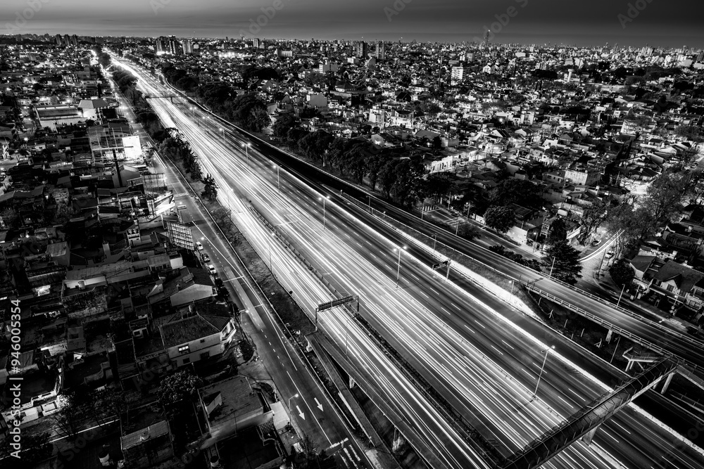 Illuminated Highway at Night with Bright Streetlights Casting Glows on ...