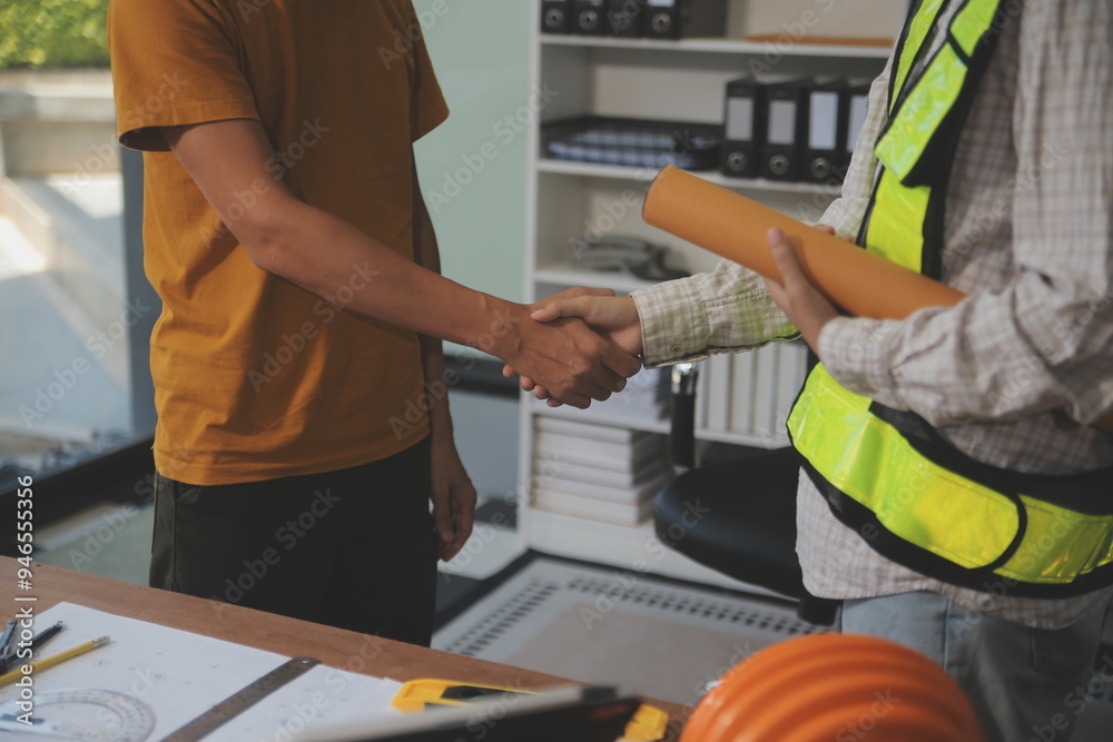 Architect men making handshake in construction site. Employee or worker ...