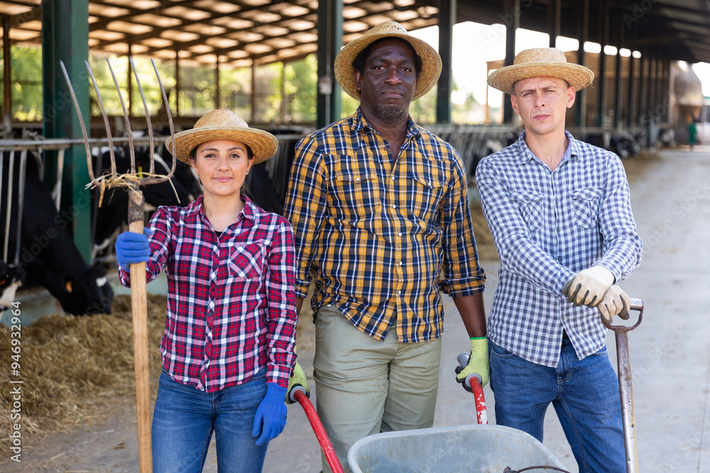 International team of farmers of different nationalities posing with ...