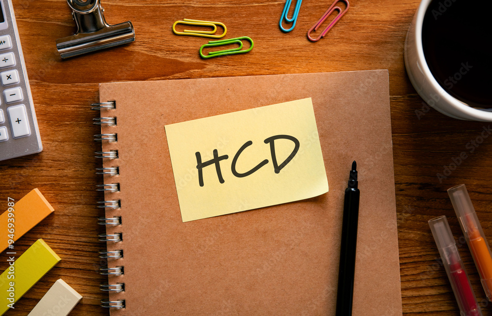 There is sticky note with the word HCD. It is an abbreviation for Human ...