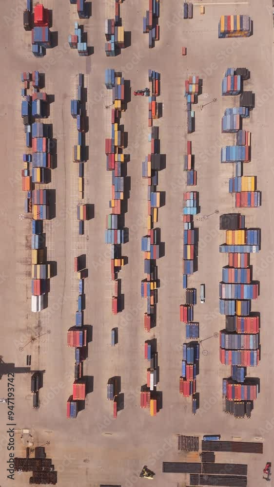Aerial view of porto de setubal with stacked containers at the bustling ...