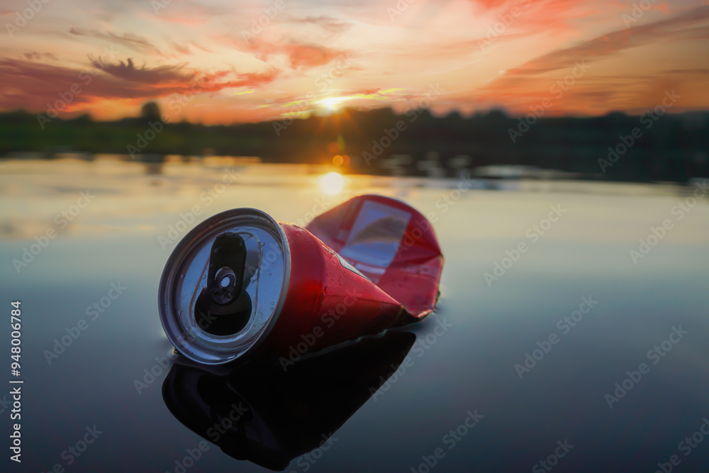 Beer can waste in lake. Empty metal soda can garbage, food waste in ...