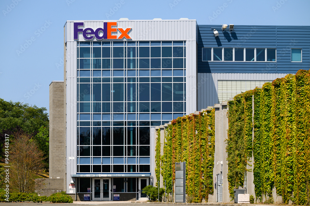 Everett, WA, USA - July 28, 2024; FedEx building with name on structure ...