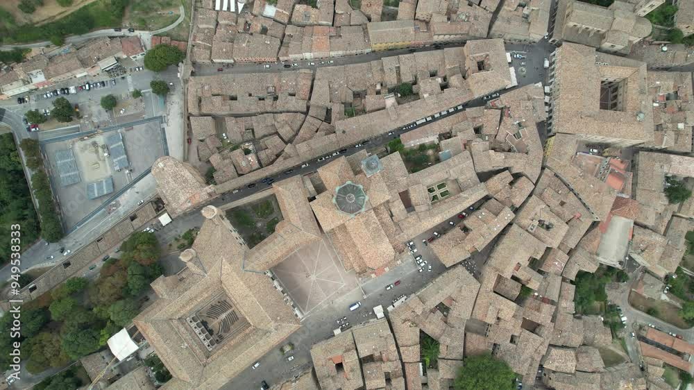 High-angle aerial view of a historic city characterized by tightly ...