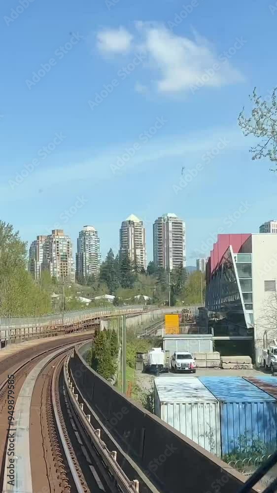 Landscape view of the front view of skytrain in Vancouver city-see ...