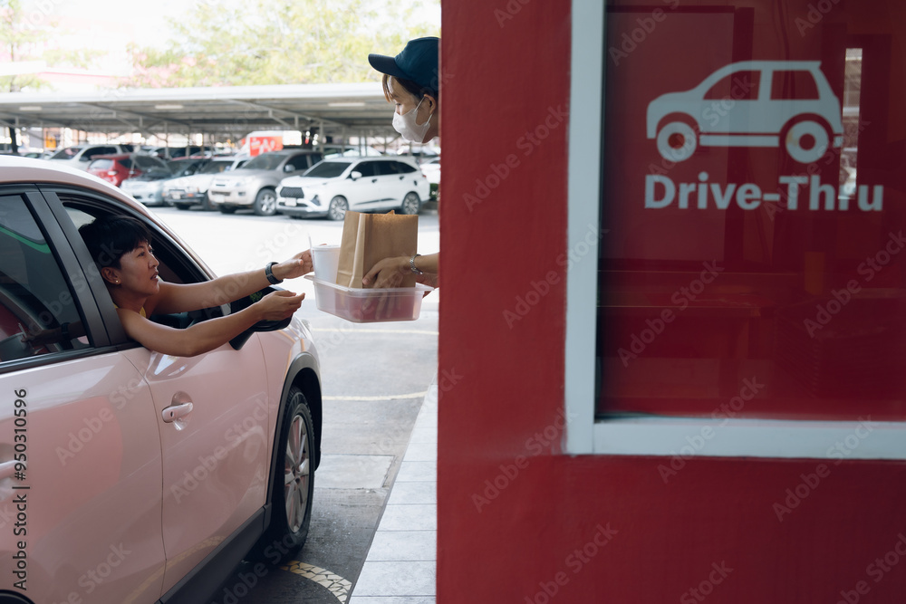 Women pick up food from drive-thru counters, drive-thru counters, and ...