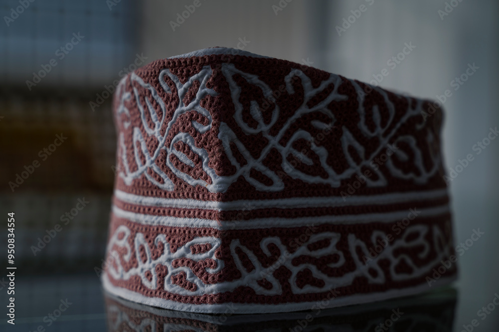 A traditional Omani cap in beautiful colors called kumma , which is ...