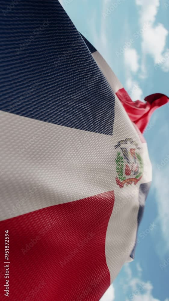 Wavy flag of Dominican Republic blowing in the wind in slow motion ...