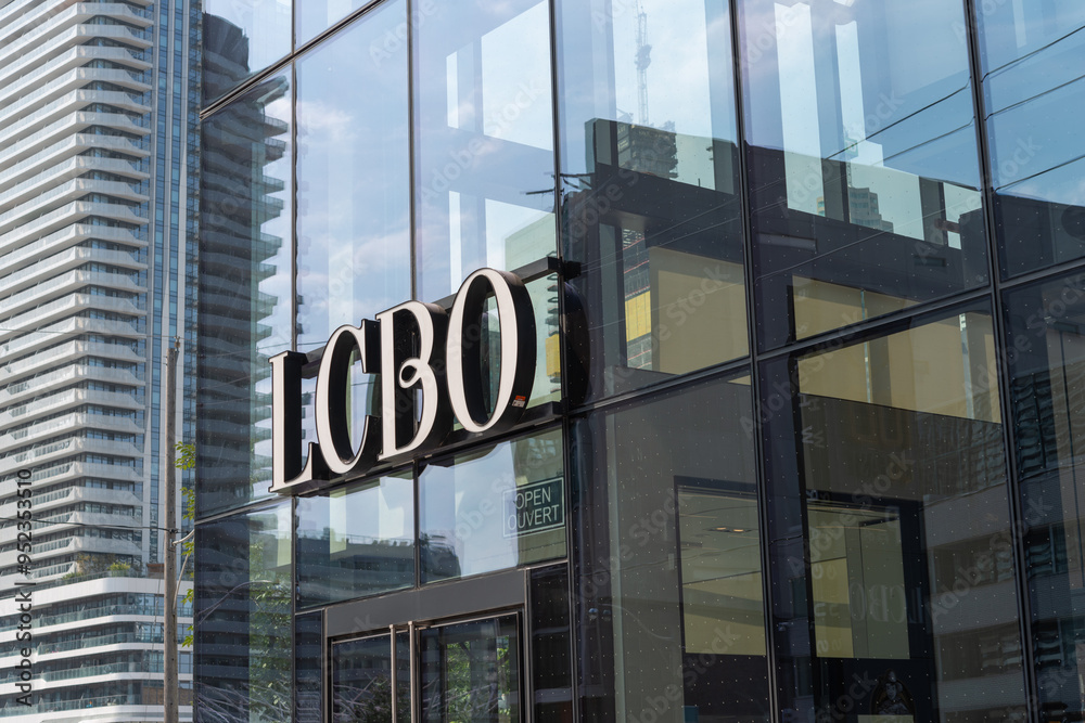 sign on the exterior of a LCBO location (here at 1300 Cooper Street) in ...
