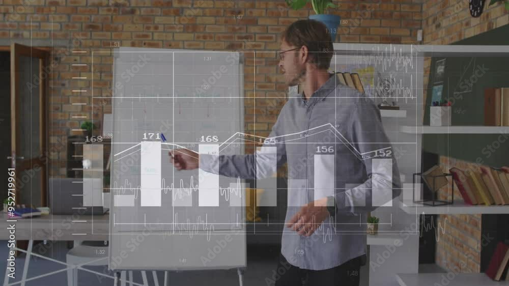 Pointing at whiteboard, man presenting financial data analysis in ...