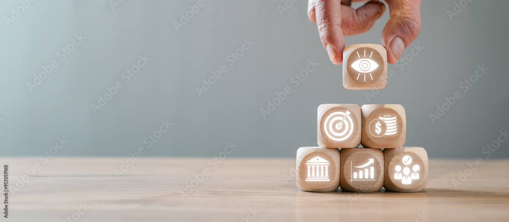 Wooden blocks illustrating the balanced scorecard concept, showcasing ...